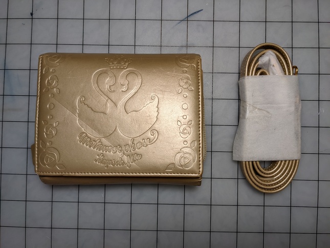 Metamorphose Old School Swan Stamped Wallet with Shoulder Strap in Gold ...