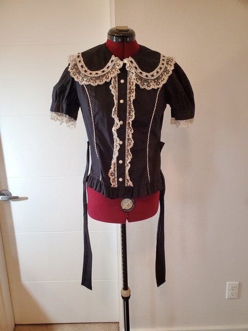 Bodyline Rabbit Ear blouse black w/ white lace trim - Blouses - Lace ...